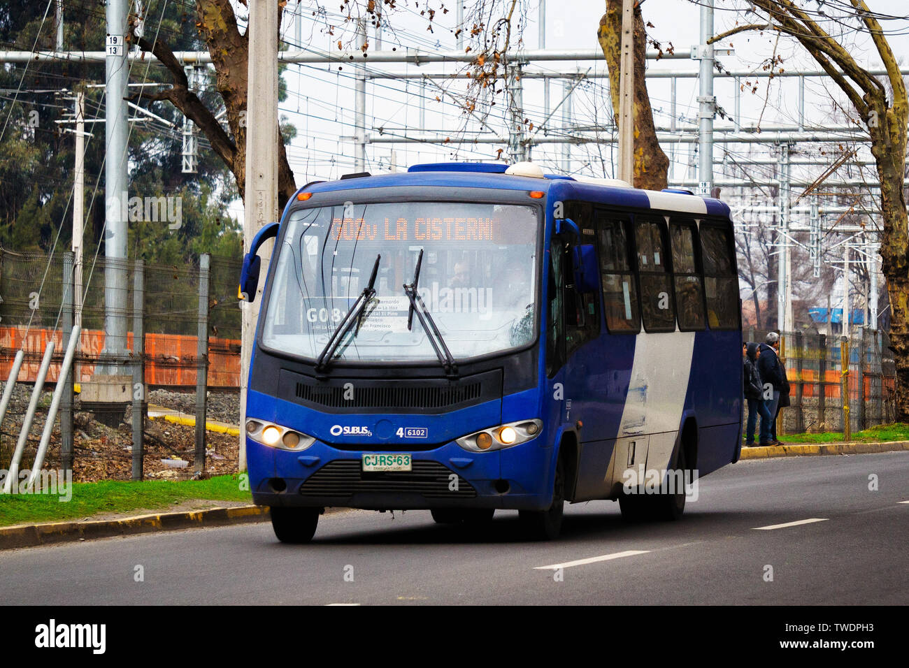 SANTIAGO, CHILE - JULY 2016: A small Transantiago bus on the suburbs of ...