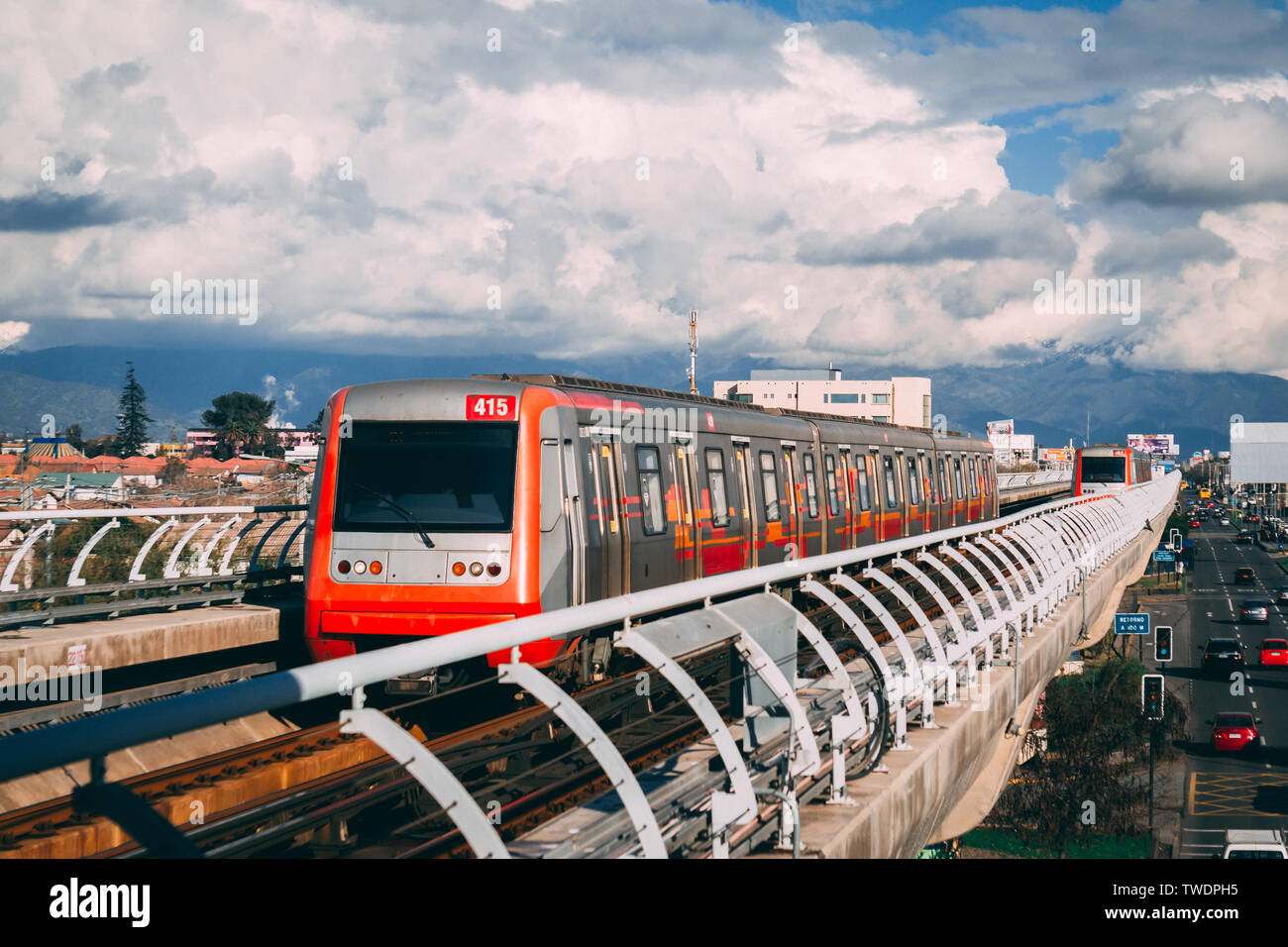 SANTIAGO, CHILE - JULY 2016: Two AS02 steel trains on the viaduct of L4 ...
