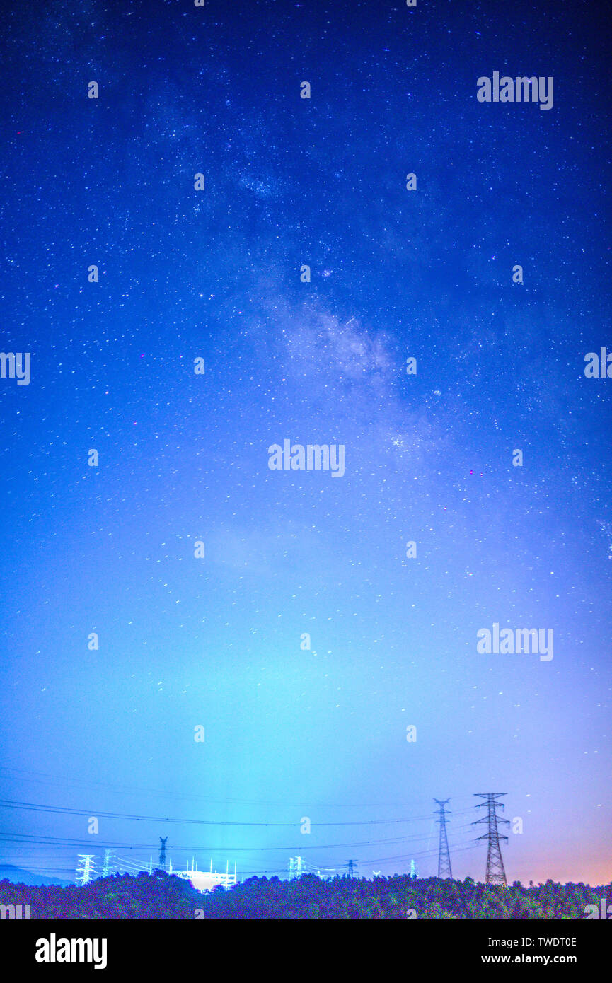 Light pollution of rural galaxies and substations Stock Photo - Alamy