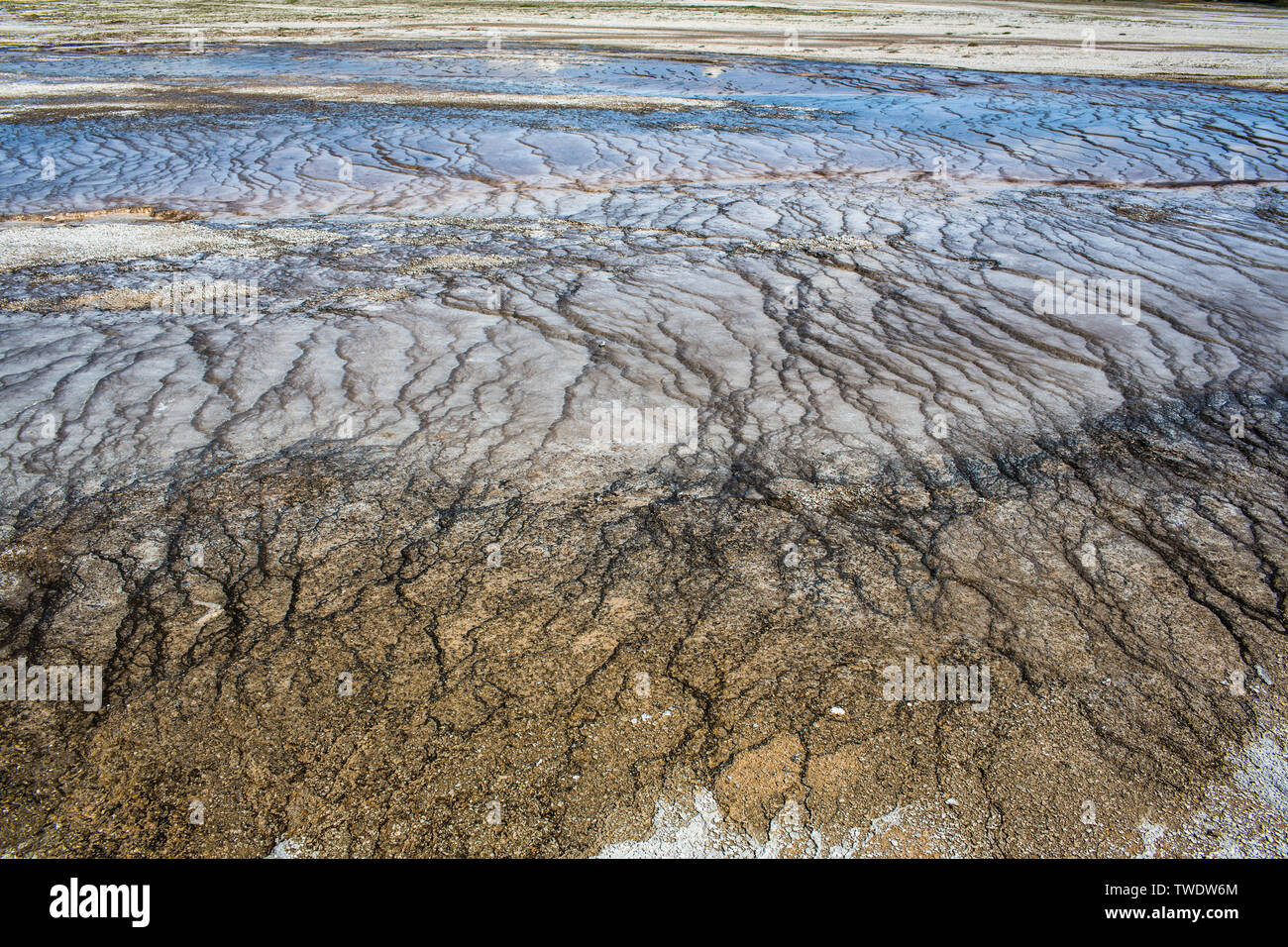 Microorganisms and algae dye the rock formations of the Great Prism Hot ...