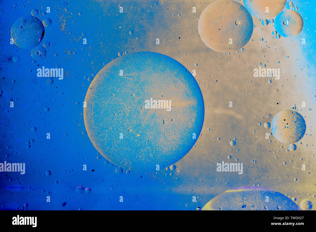 Oil bubbles inside water base form patterns Stock Photo - Alamy