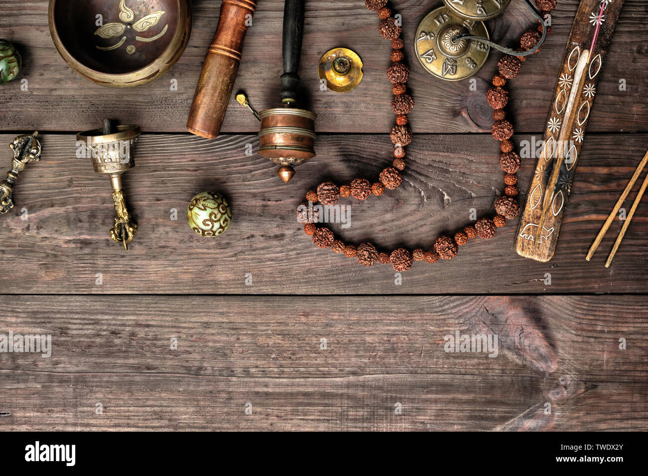 Copper singing bowl, prayer beads, prayer drum and other Tibetan ...
