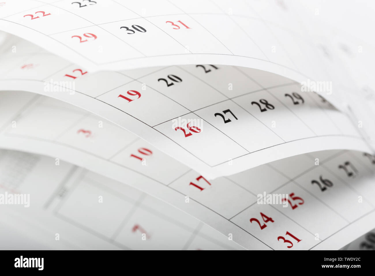 Calendar pages close up business time concept Stock Photo - Alamy