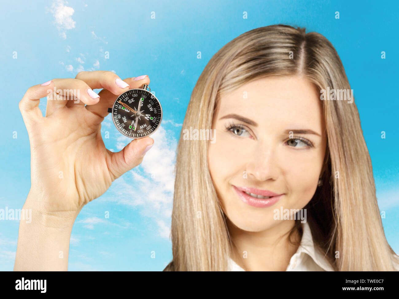 Caucasian Woman Holding Compass Isolated Stock Photo - Alamy