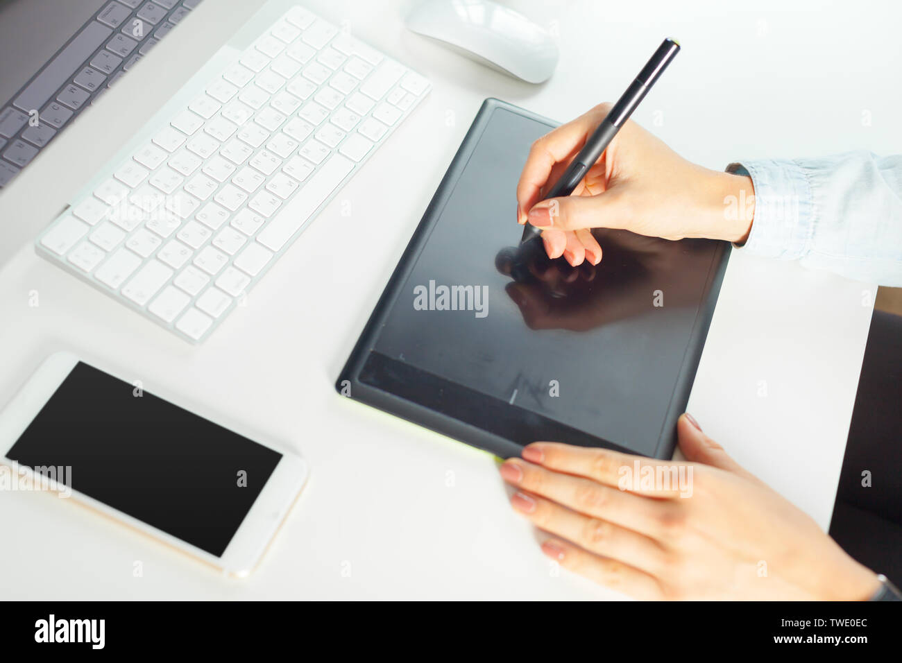 Photography artist using graphic tablet hi-res stock photography and ...