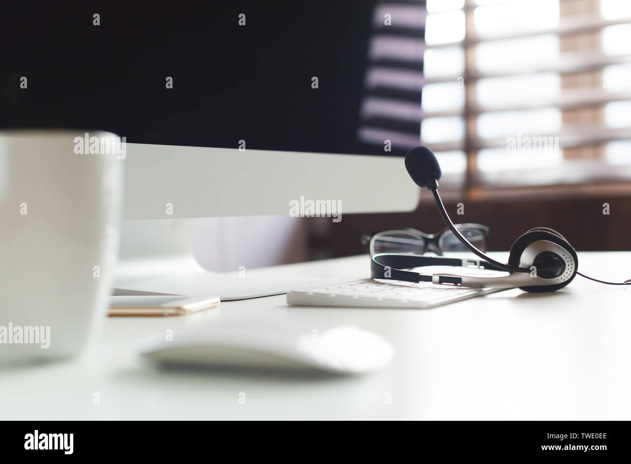 laptop computer with headset Stock Photo - Alamy