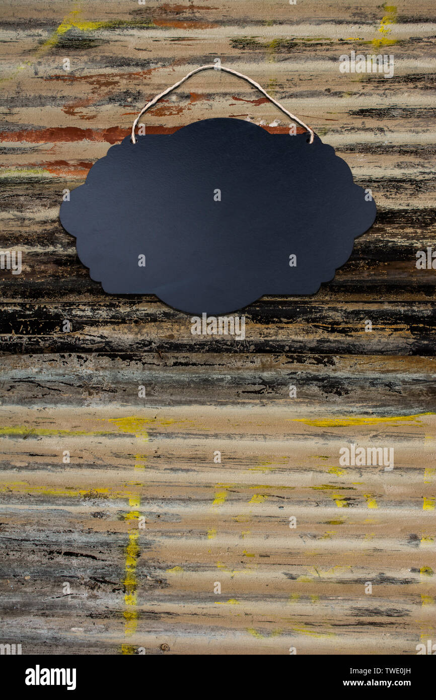Black Empty Sign Board with string for hanging on wall Stock Photo - Alamy