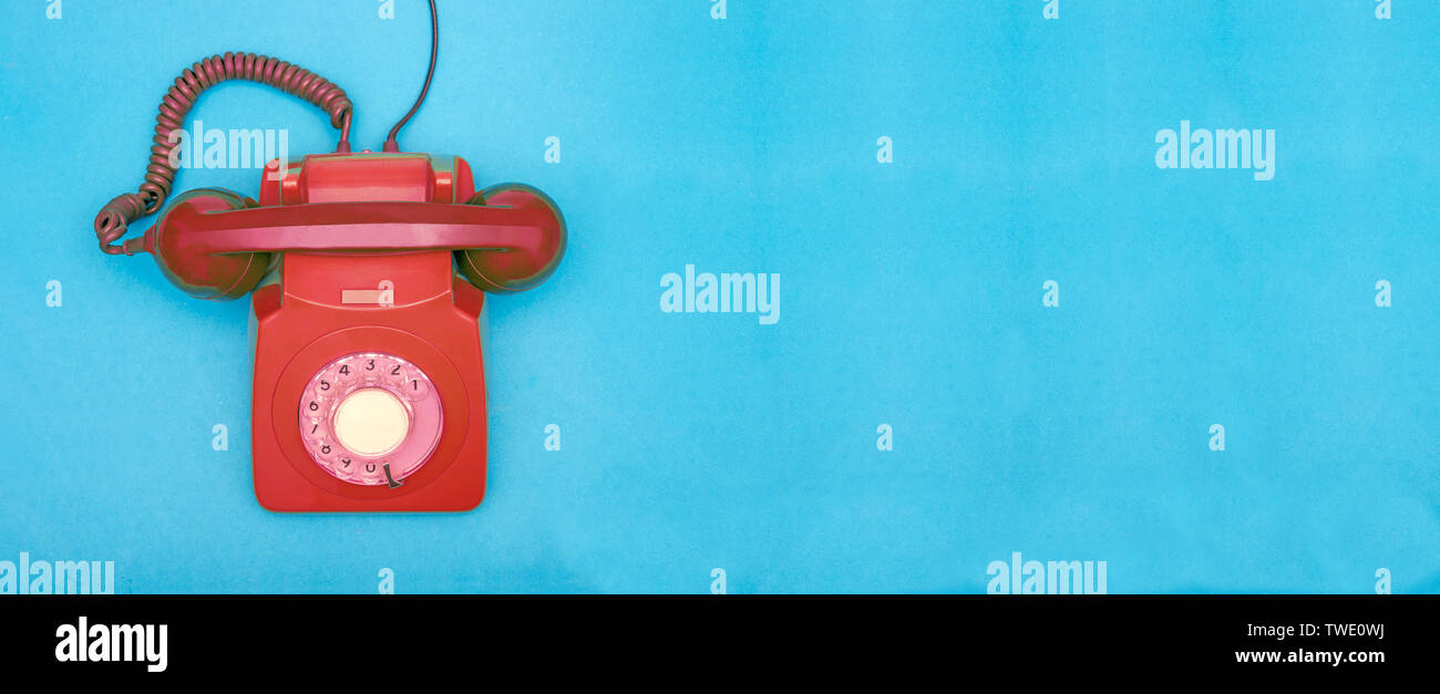 Old red phone set top view photo, communication concept background ...