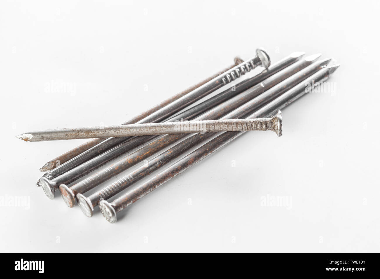 nail isolated on white Stock Photo - Alamy