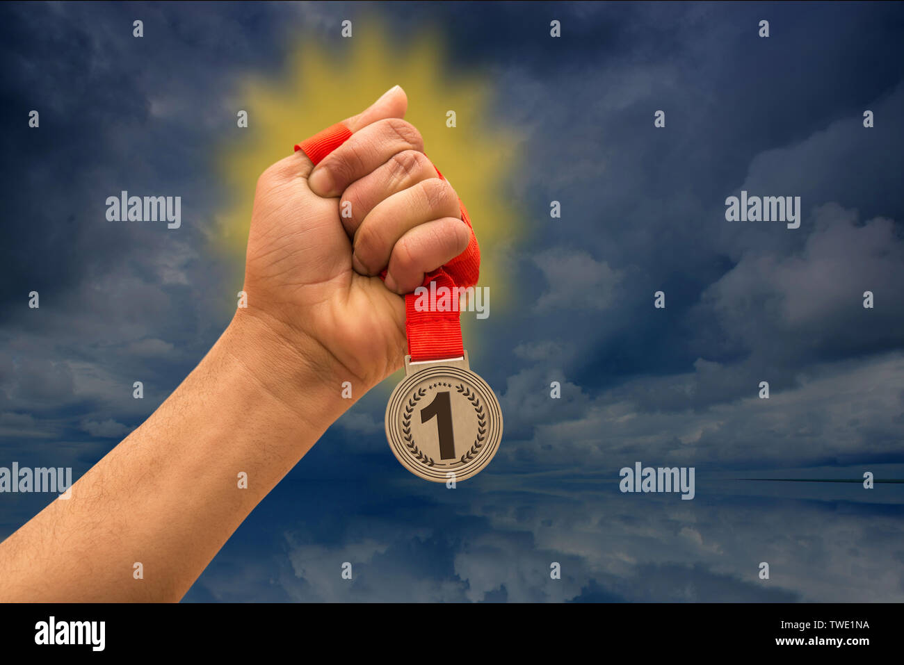 1st position award Ribbon in hand, banner ?Success concept background ...