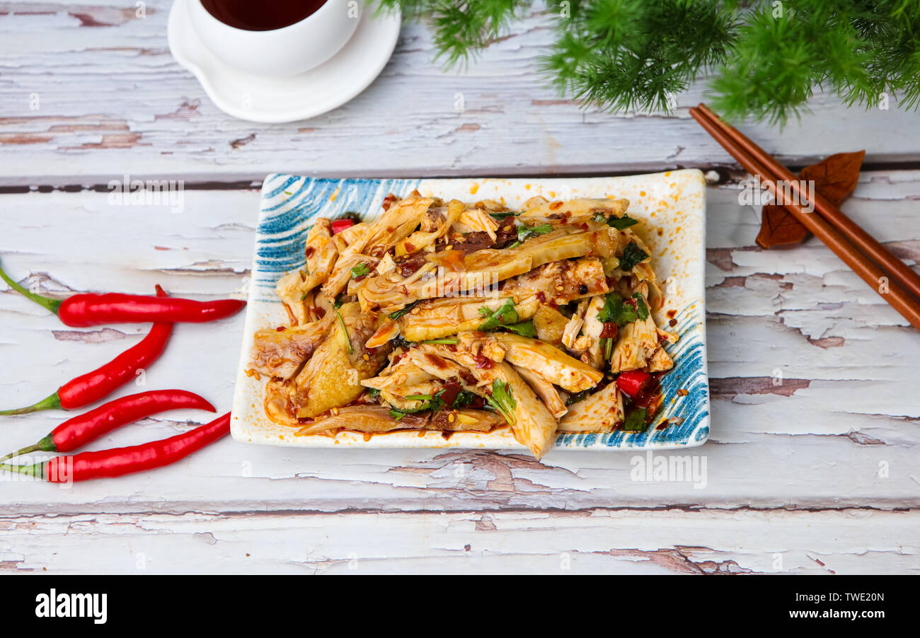 drooling chicken, stick chicken Stock Photo - Alamy