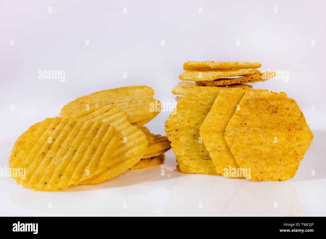 Chips, potatoes, nachos, snacks, fried food Stock Photo - Alamy