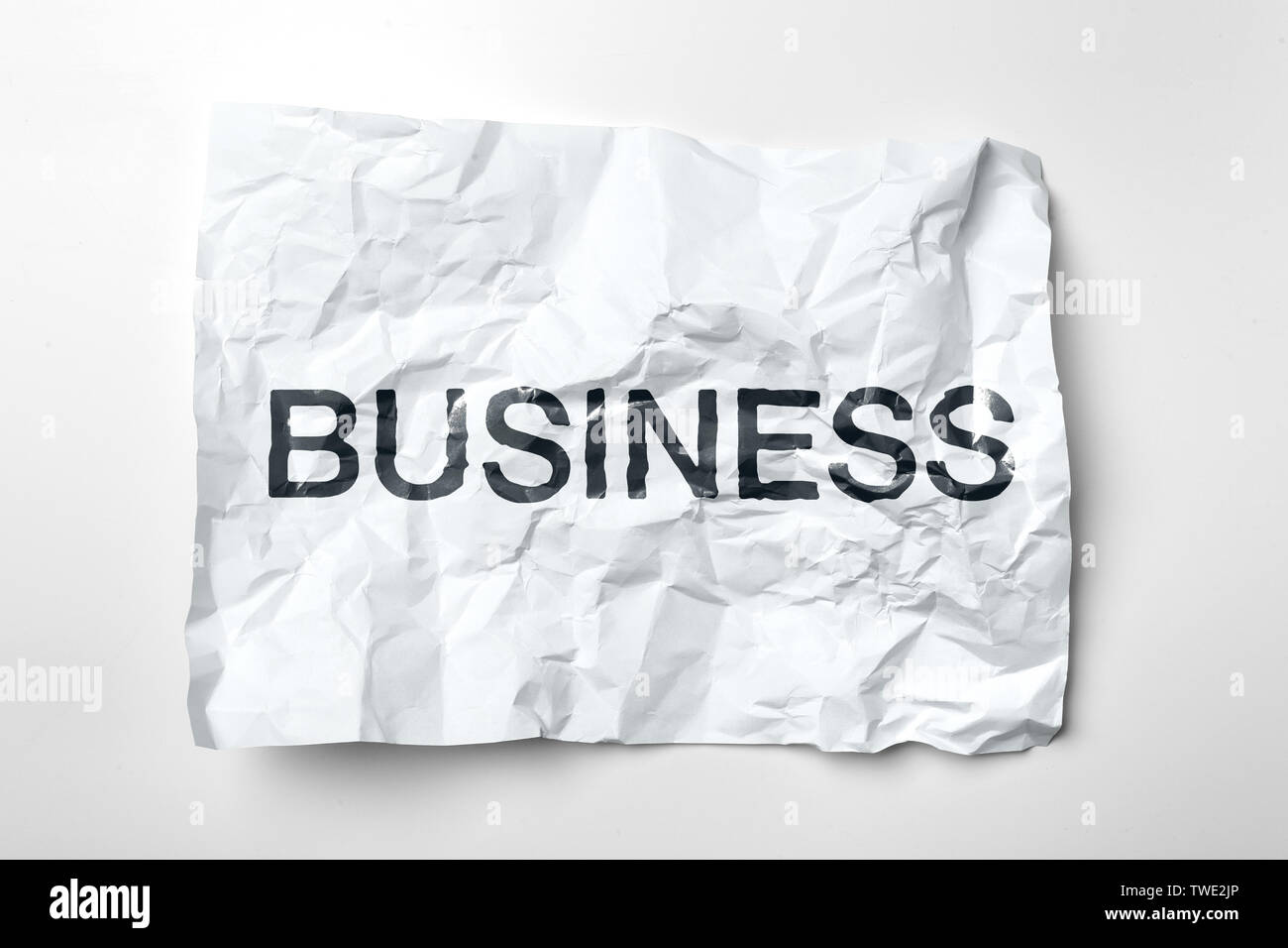 crumple sheet of paper with text Stock Photo - Alamy