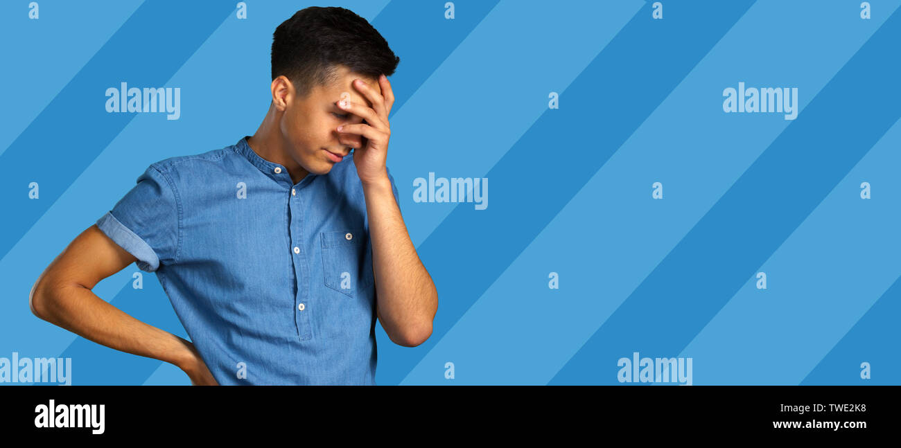 Puzzled thoughtful young man curiously looking at camera Stock Photo ...