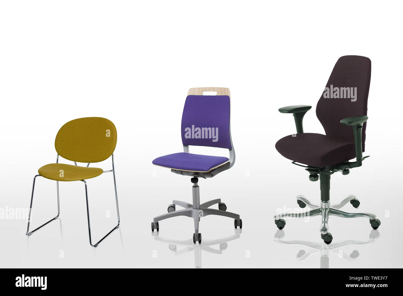 Three chairs isolated on white background Stock Photo - Alamy