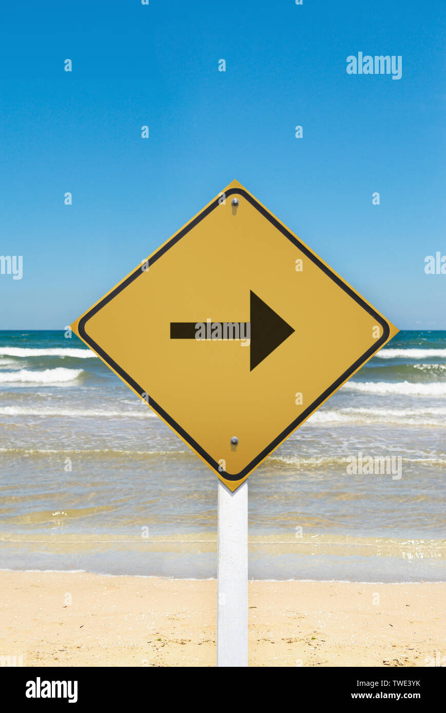 Directional sign board on the beach Stock Photo - Alamy