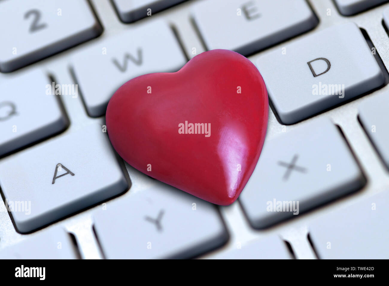 Heart shape on a laptop keypad Stock Photo - Alamy