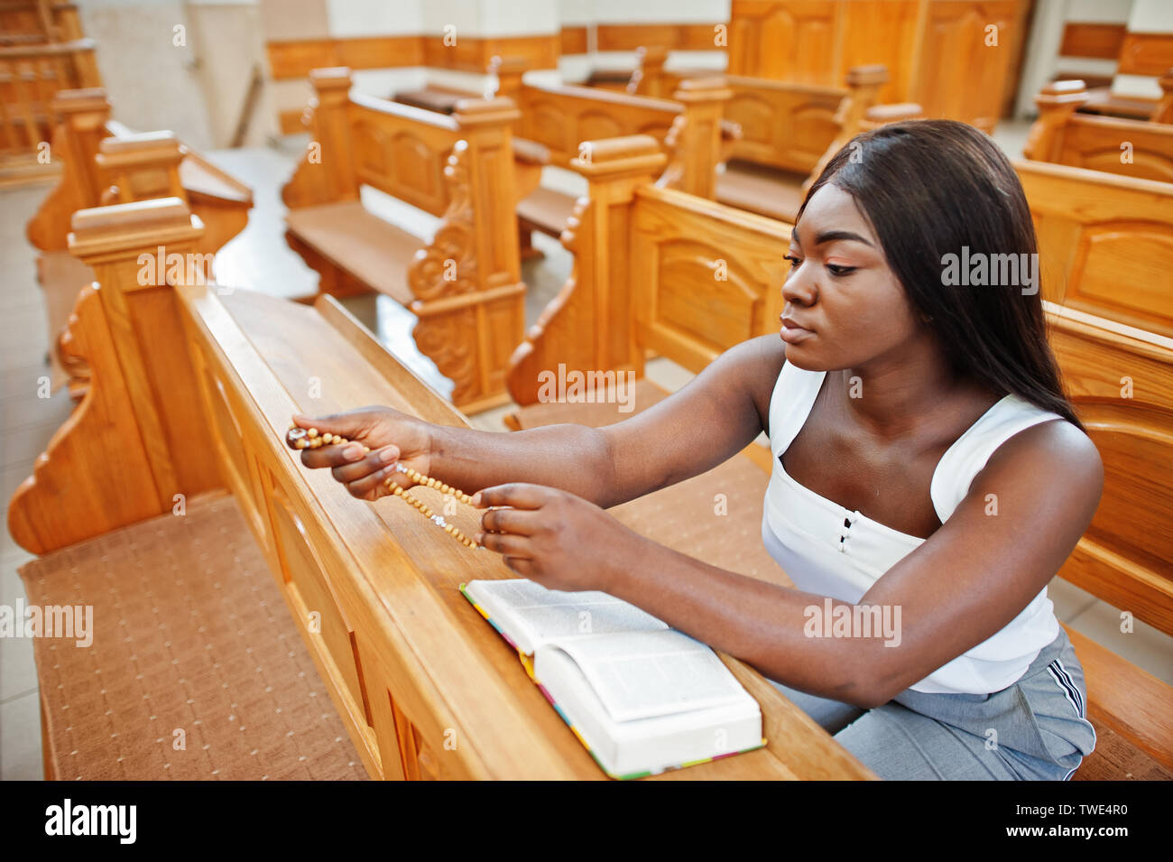 Black Woman Praying In Church
