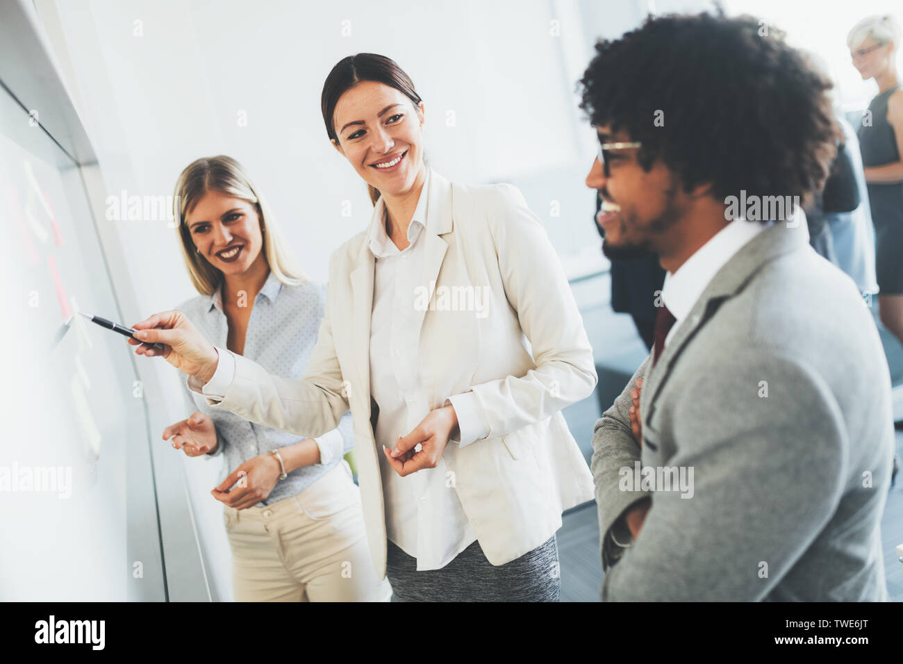 Diverse group of focused work colleagues during a planning and strategy ...