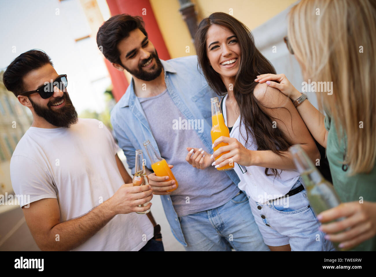 Group of friends hanging out, having fun and enjoying summer days Stock ...