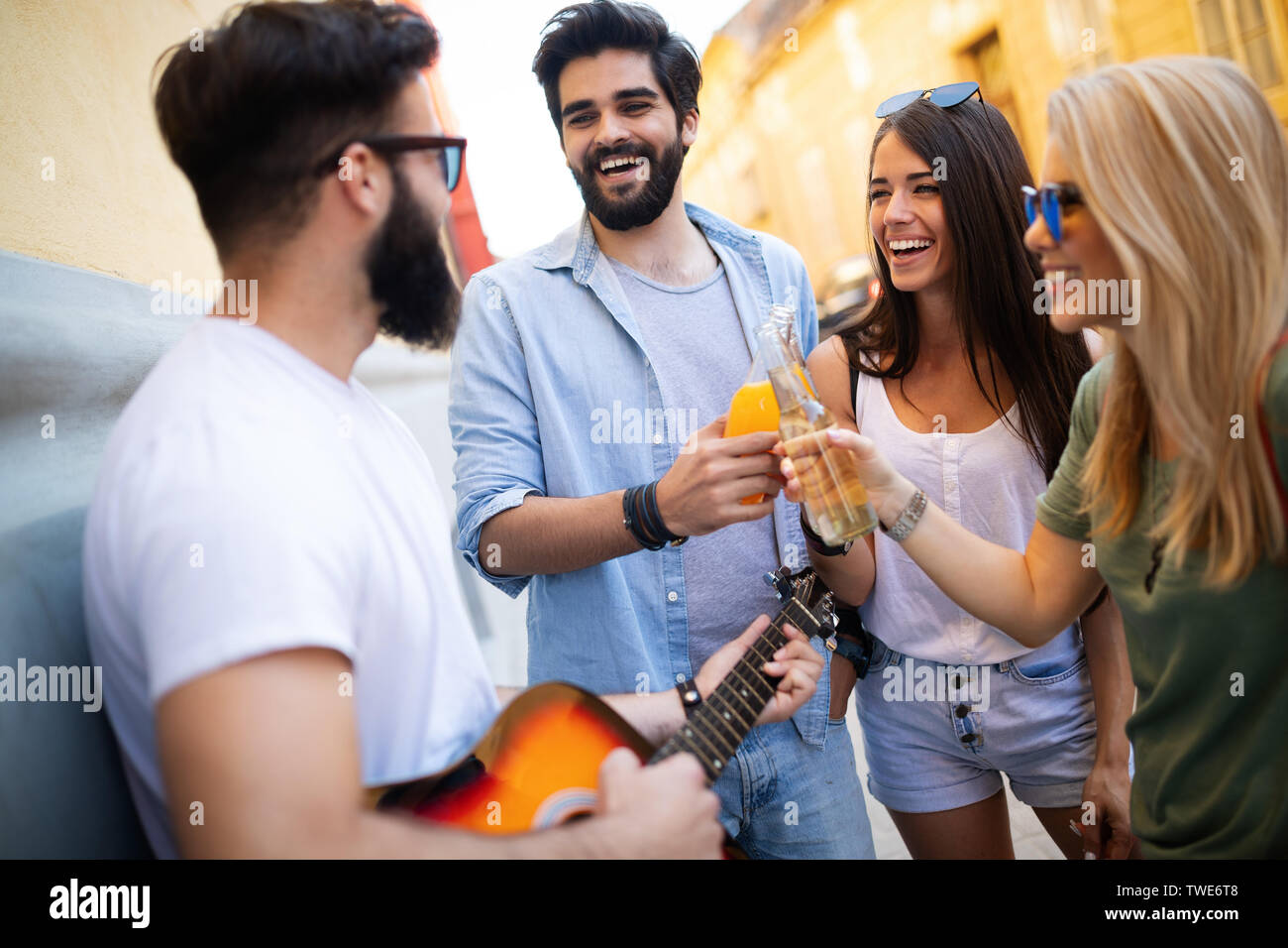 Group of young friends having fun together outdoor Stock Photo - Alamy