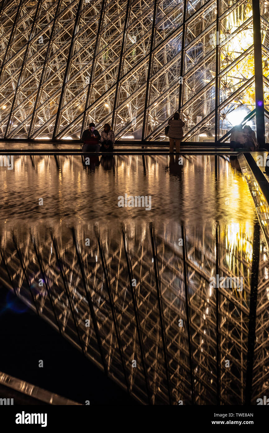 Louvre museum inside pyramid hi-res stock photography and images - Alamy