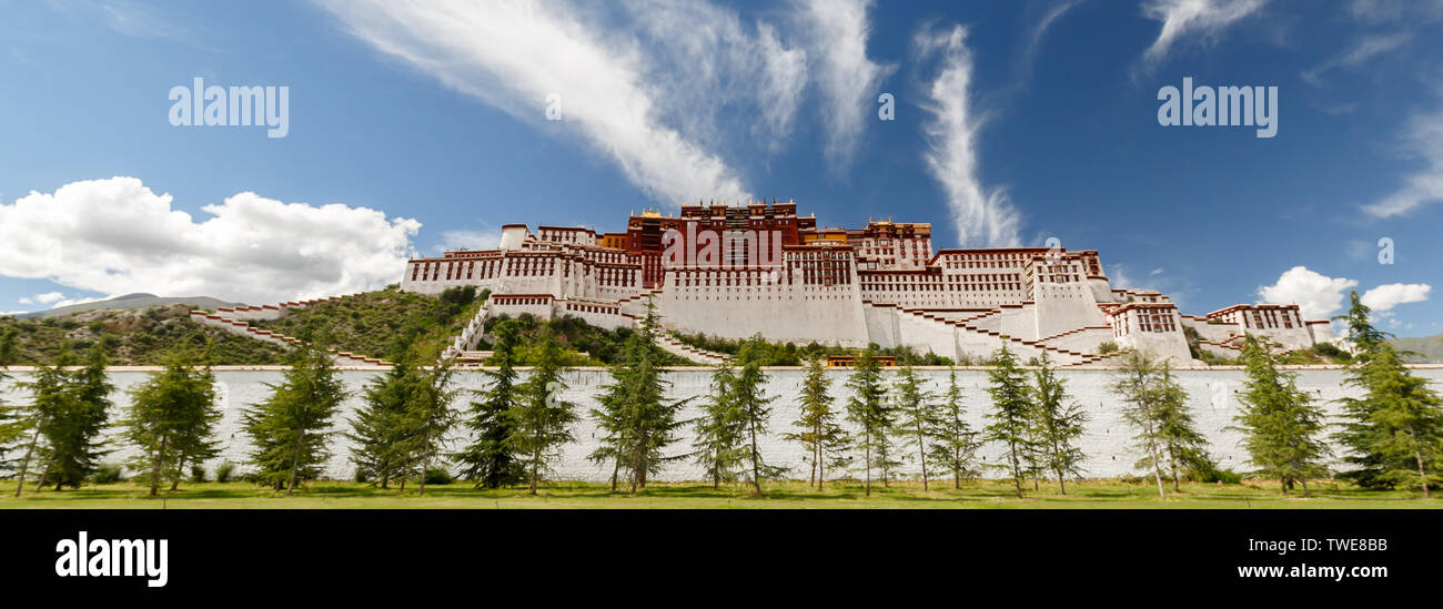 Panorama of Potala Palace with trees in the foreground. An Unesco World ...