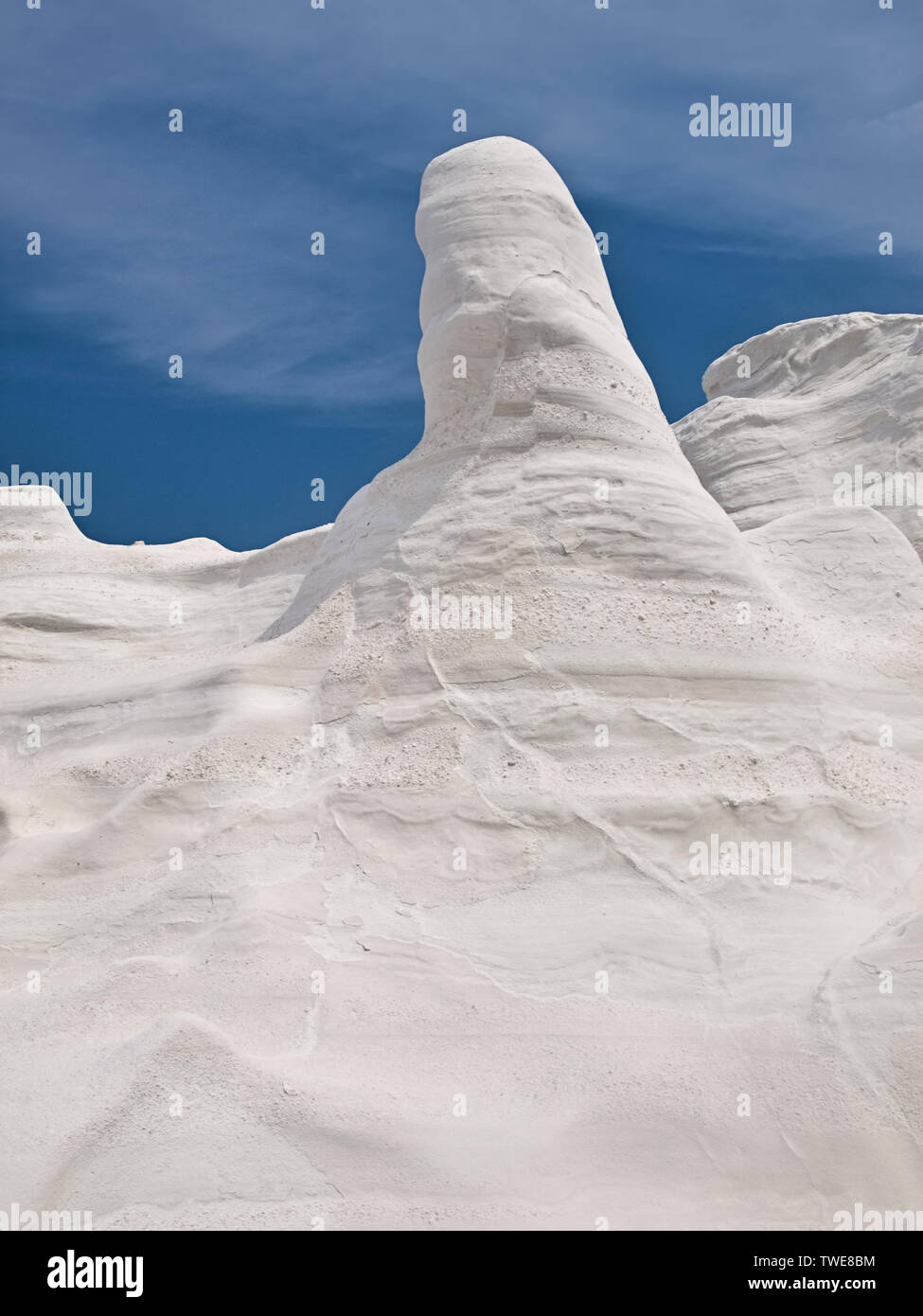 White volcanic rocks against blue sky, Sarakiniko beach at Milos island ...