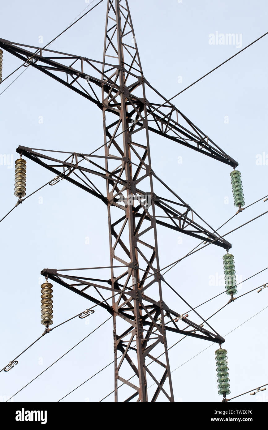 power line pole black silhouette closeup on blue sky background Stock ...