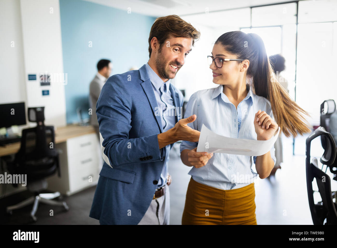 Group of successful business people at work in office Stock Photo - Alamy