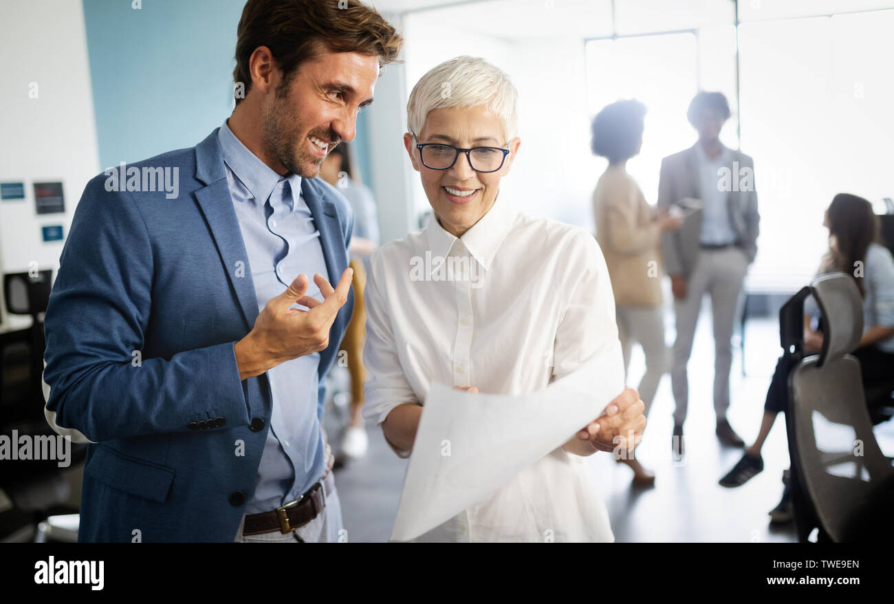 Group of successful business people at work in office Stock Photo - Alamy