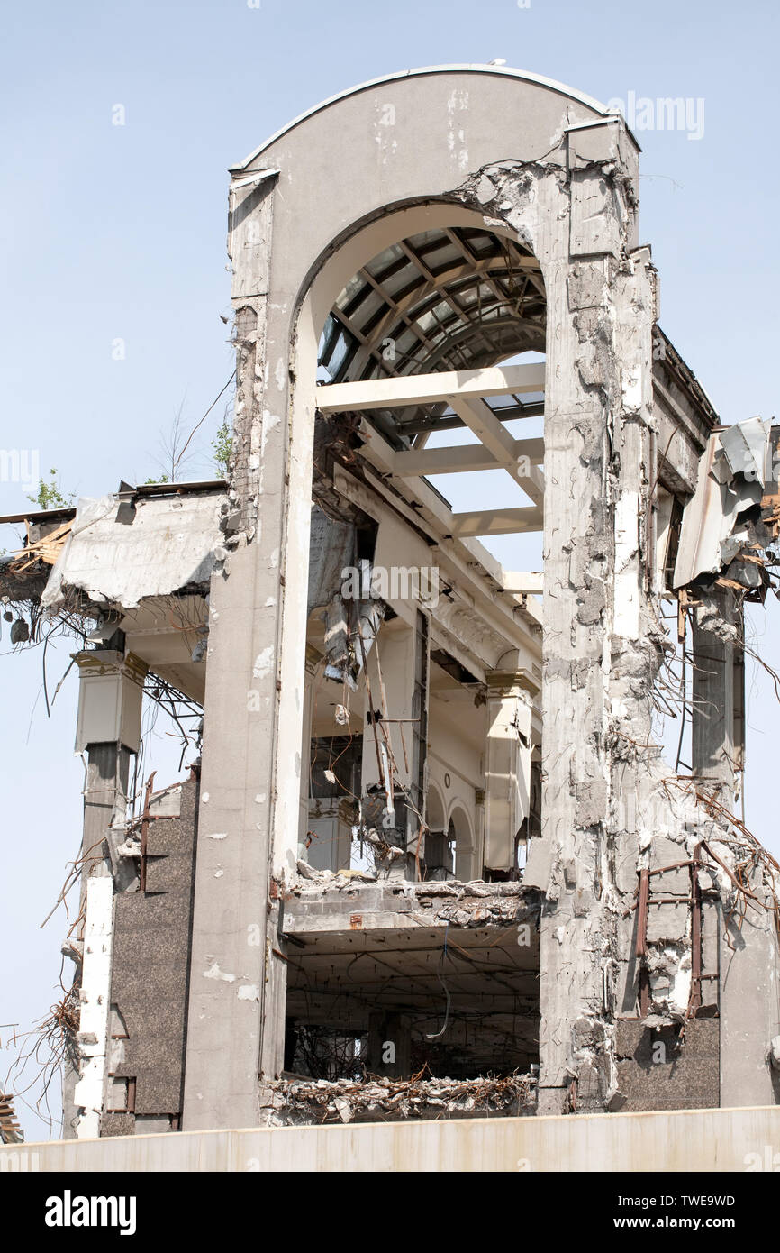 demolition of high modern building on sky background Stock Photo - Alamy