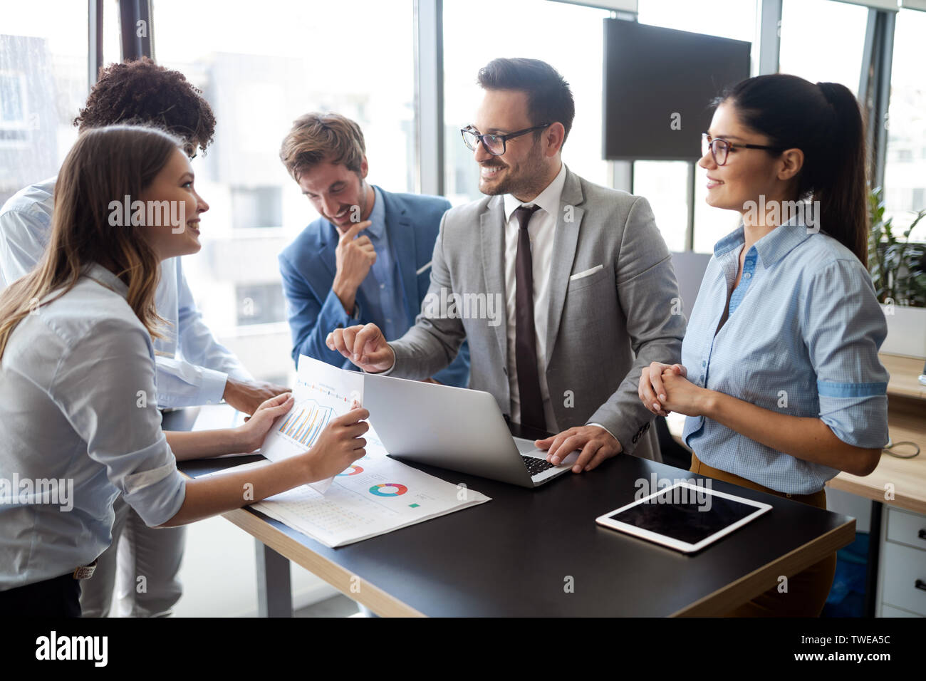 Successful business group of people at work in office Stock Photo - Alamy