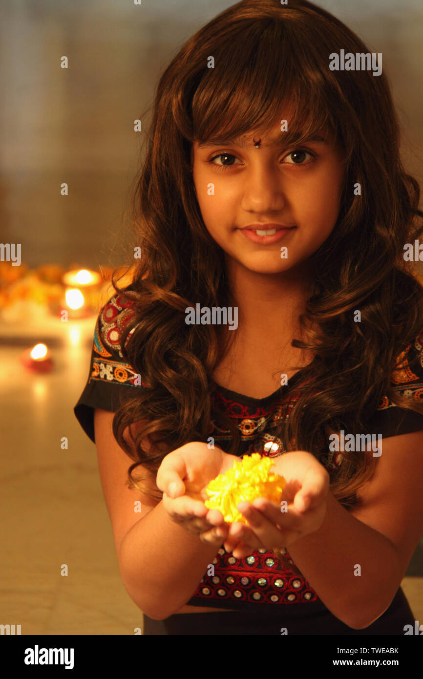 Portrait of a girl celebrating diwali Stock Photo - Alamy