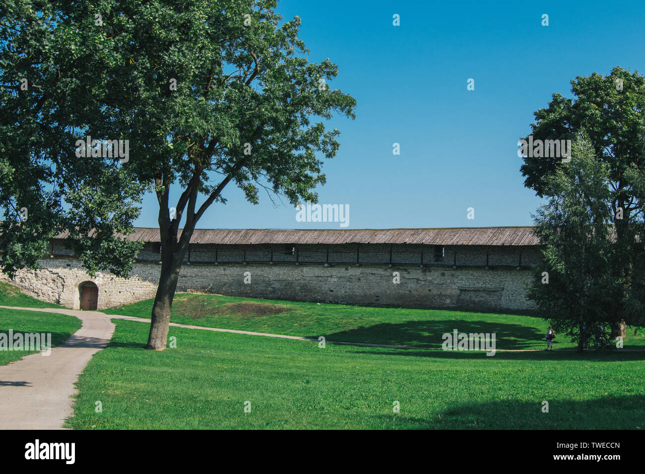 brick building in the green park in summer Stock Photo - Alamy