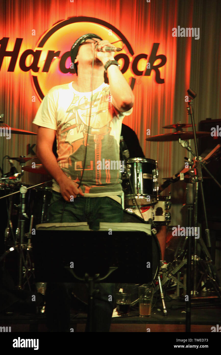 Man singing in nightclub, Malaysia Stock Photo - Alamy
