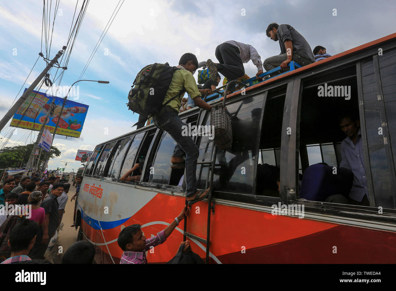 Home bound People climbing on the rooftop of bus, defying all the ...