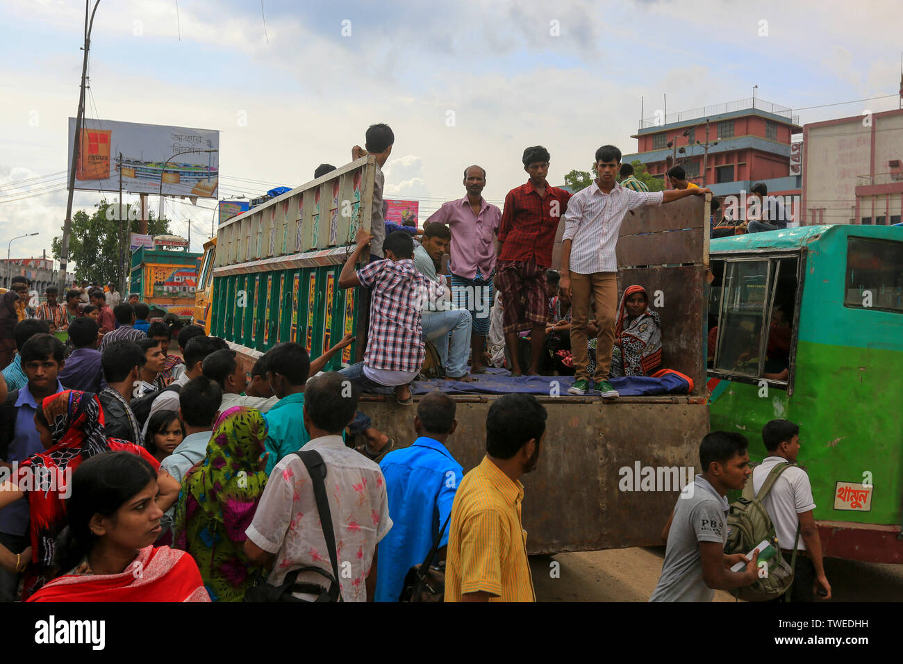 Homebound People traveling on a truck, defying all the dangers and ...