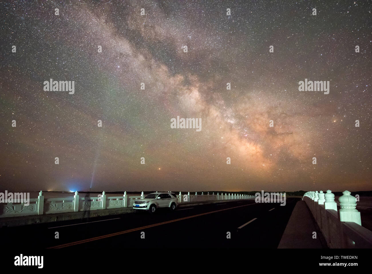 Galaxy in Xingkai Lake. Galaxy arch bridge, galactic on the lake, glow ...