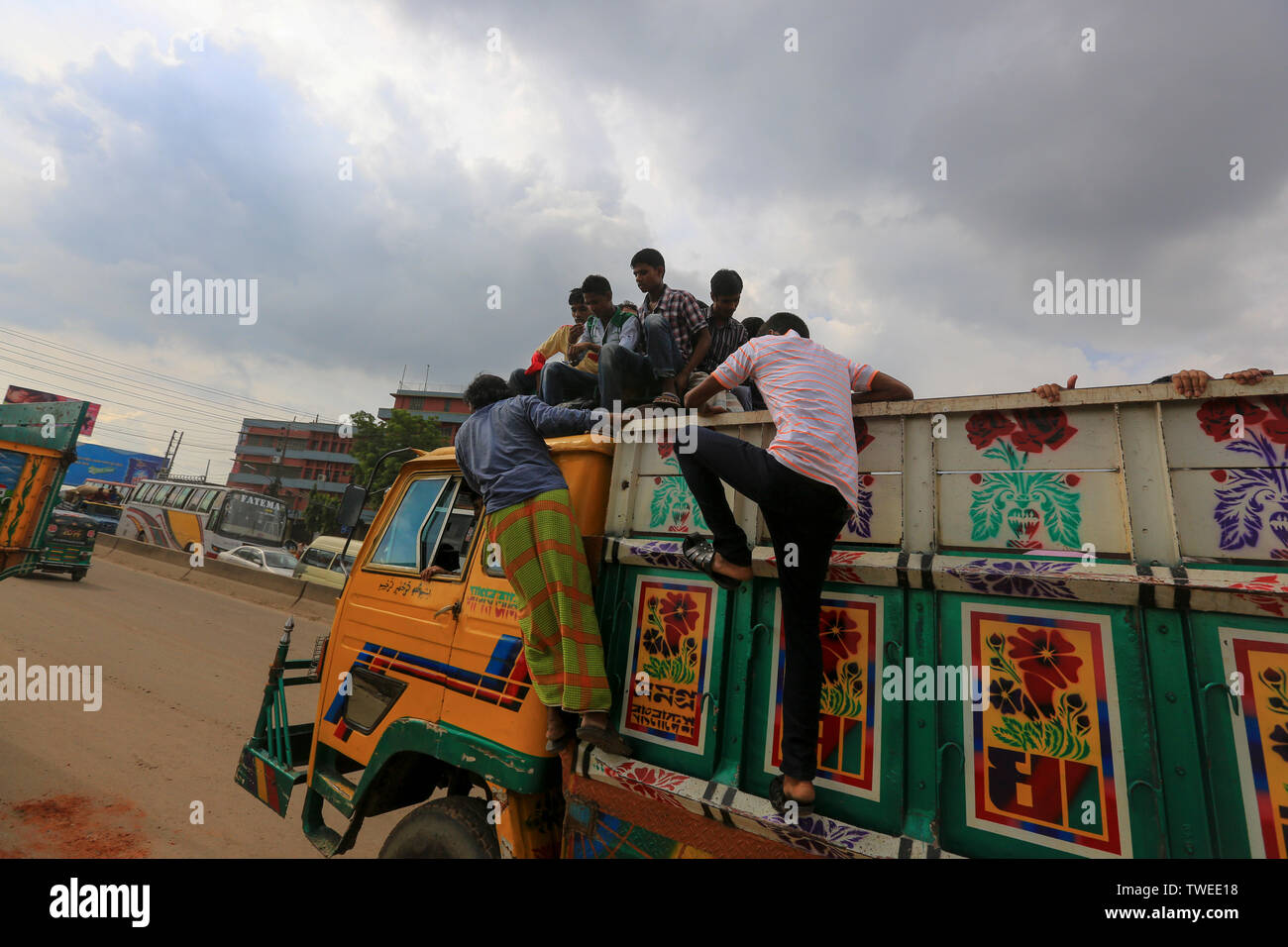 Homebound People traveling on a truck, defying all the dangers and ...