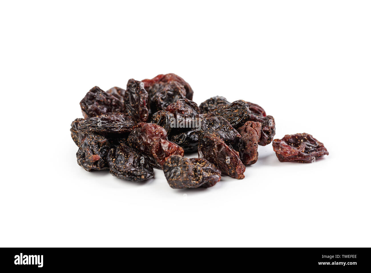 Dark raisins isoalted on white background Stock Photo - Alamy