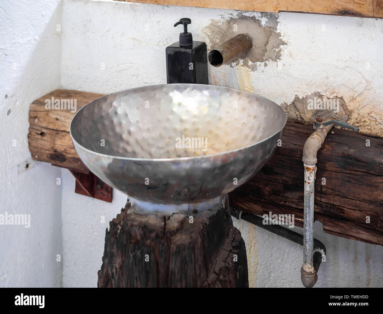 Old vintage stainless steel basin decoration on white and wooden ...