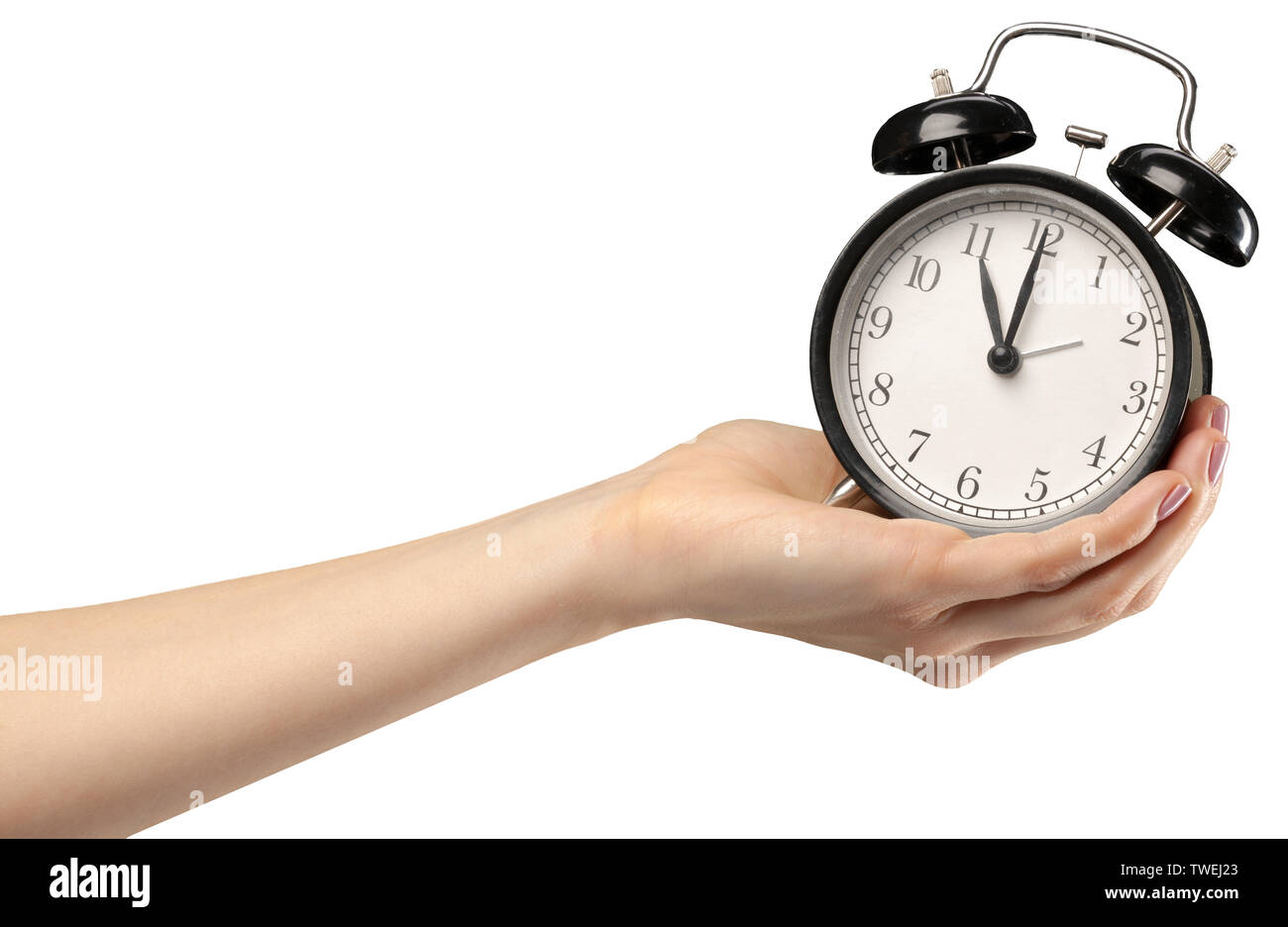 Hand holding retro alarm clock with white background Stock Photo - Alamy