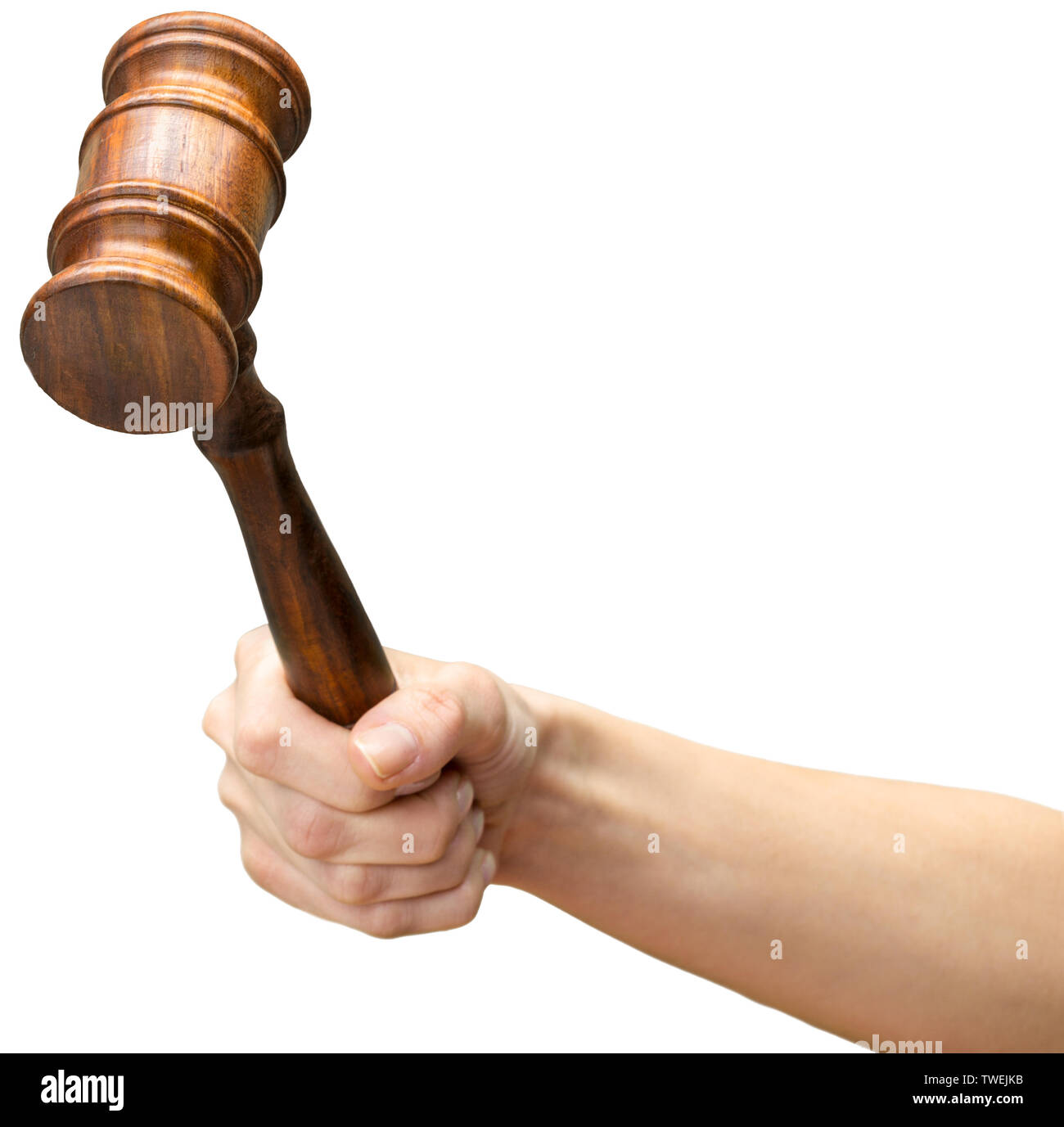 someones hand holding Wooden Law Gavel Stock Photo - Alamy