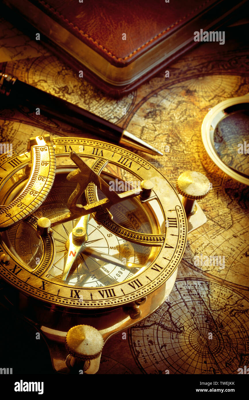 Old vintage compass and travel instruments on ancient map Stock Photo ...