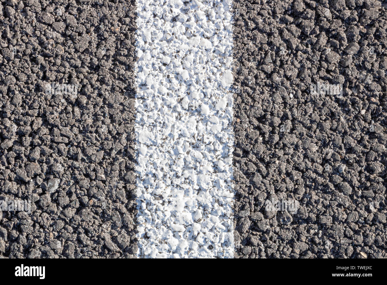 Road marking, continuous white band, white line on bitumen Stock Photo ...