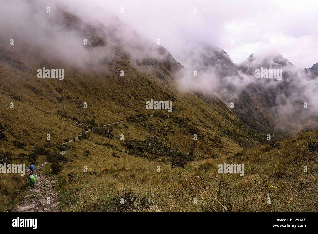 Anden, Peru. 02nd May, 2019. Two tourists descending the highest point ...