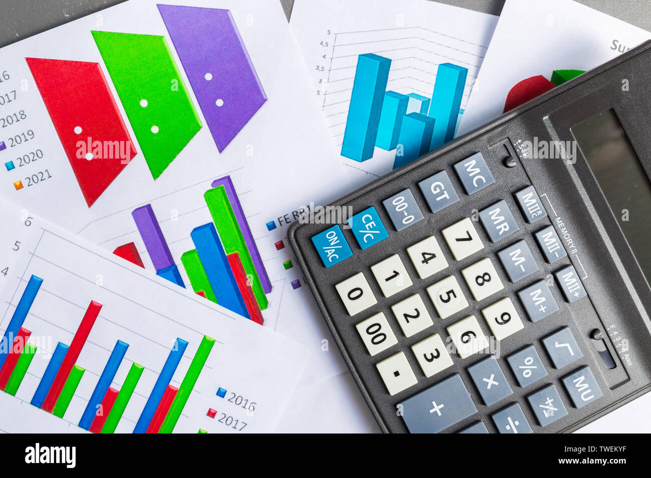 Checking accounting report on business table. Calculator Stock Photo ...