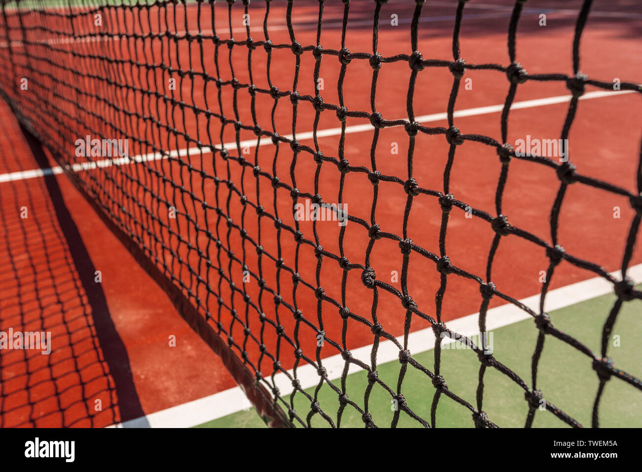 Tennis net on a tennis court background Stock Photo - Alamy