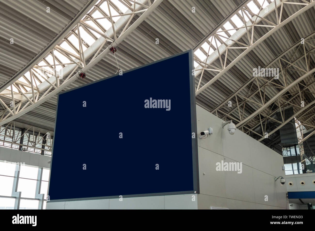 Blank large billboard with camera cctv with structure in the airport ...